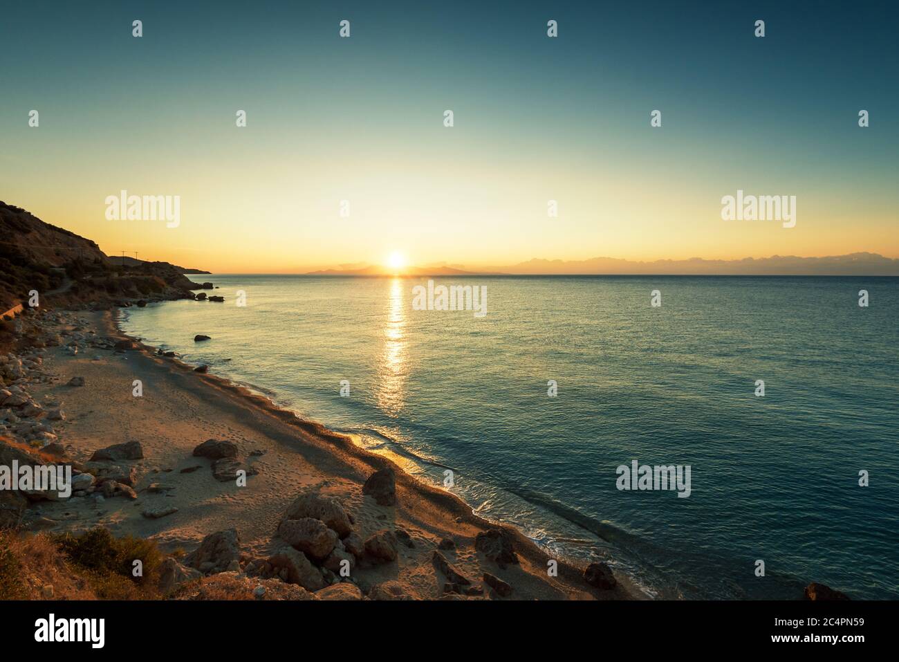 Sunrise over the sea, the rolling calm waves in Greece Stock Photo - Alamy