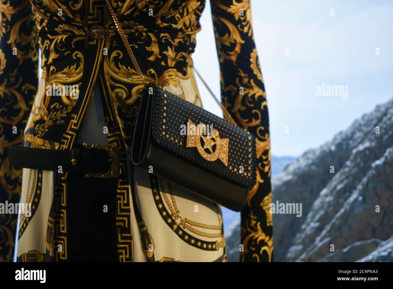 Milan, Italy - January 11, 2020: Black and golden Versace leather purse ...