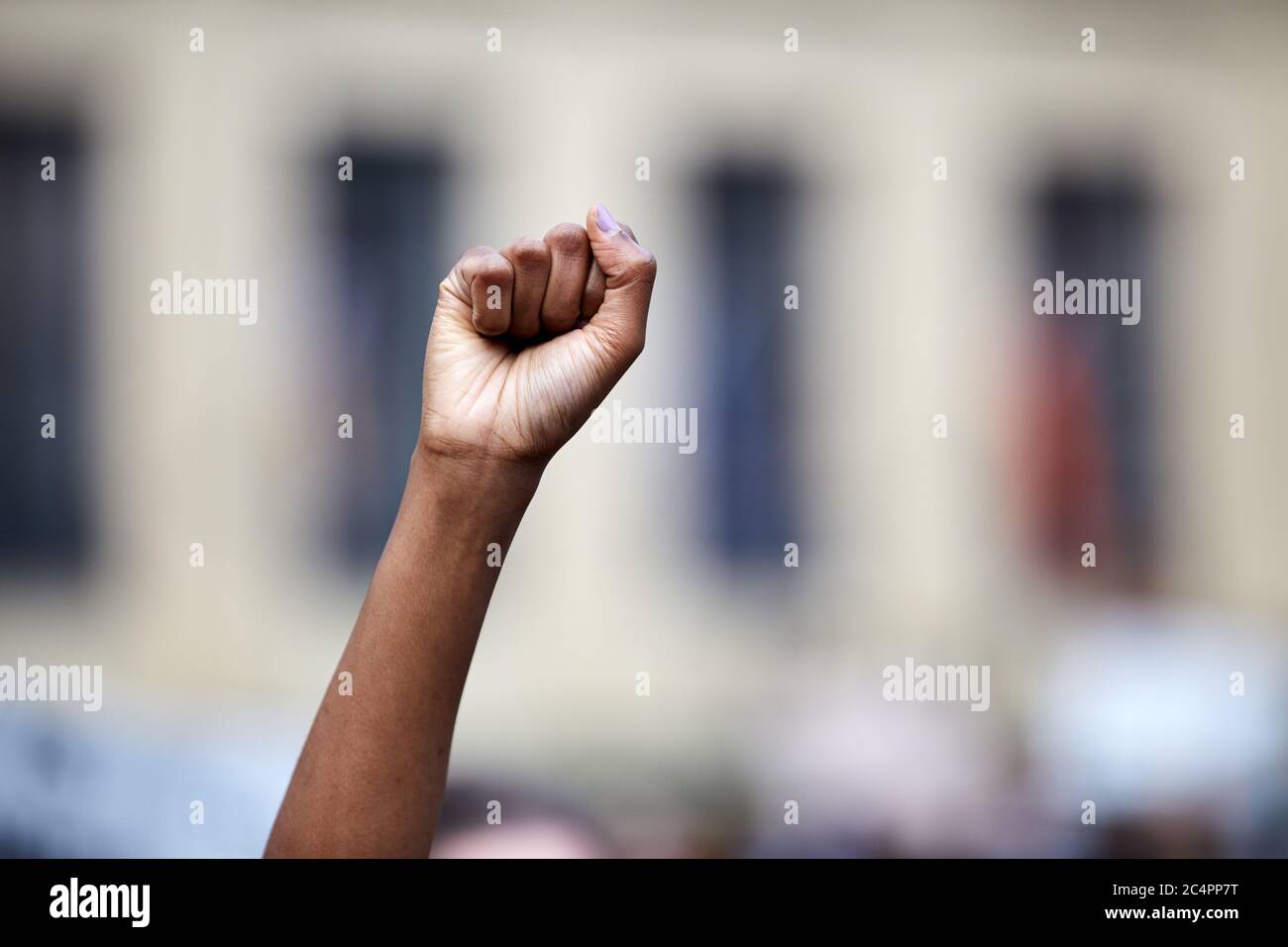 Black man fist above head hi-res stock photography and images - Alamy