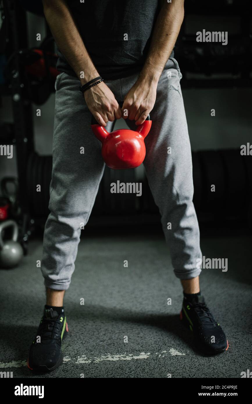 Young athlete doing exercise kettlebell hi-res stock photography and ...