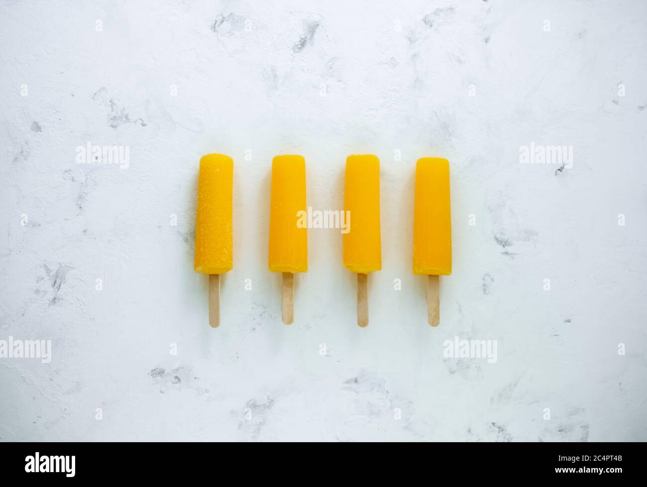 Orange fruit ice isolated on a white background. Stick ice cream Stock ...