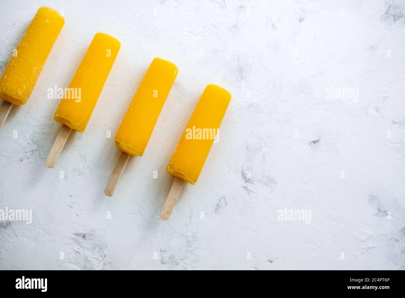 Orange fruit ice isolated on a white background. Stick ice cream Stock ...