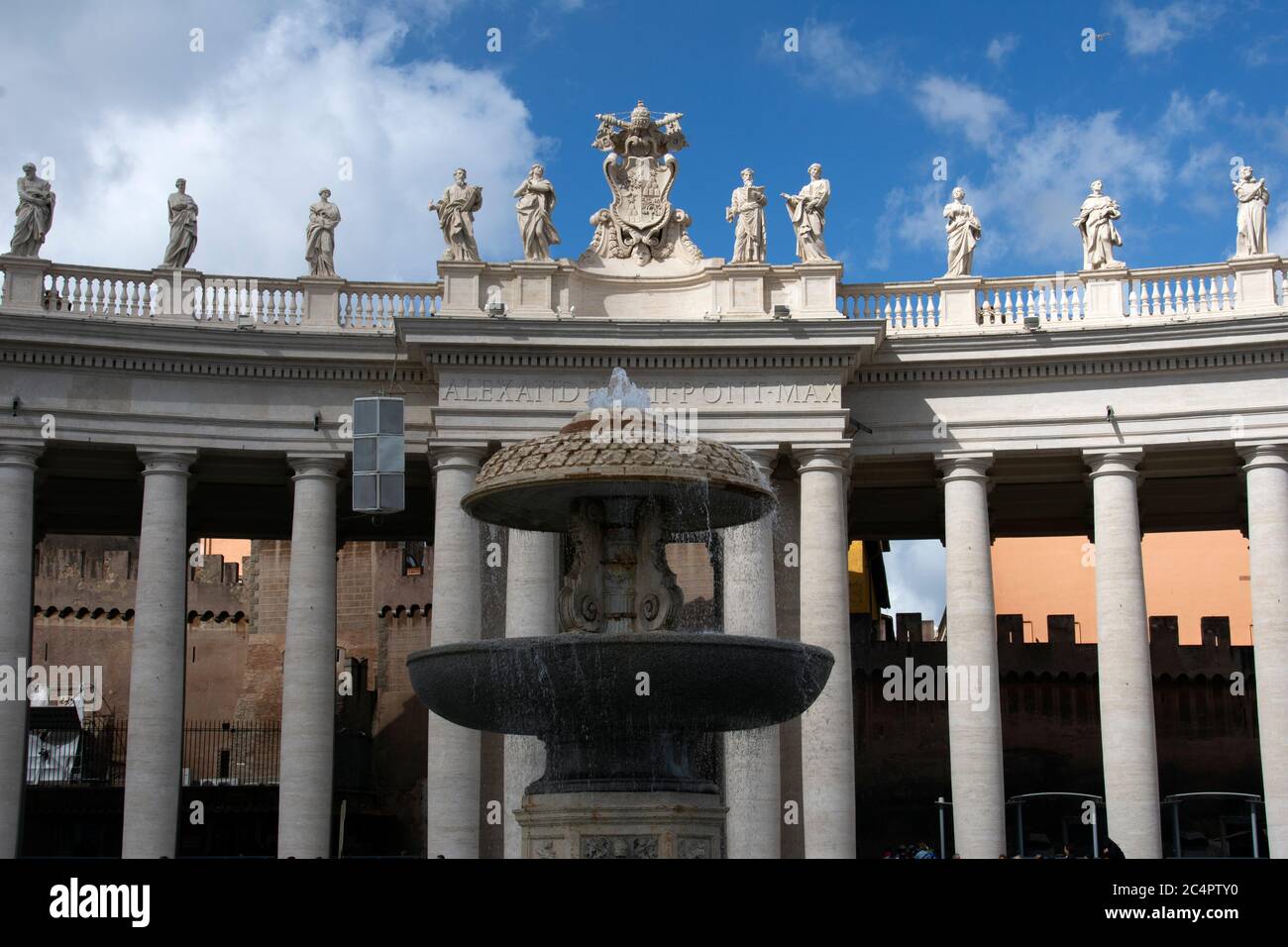 Statues of saints on top of Doric colonnades and granite fountain designed by Bernini at St ...