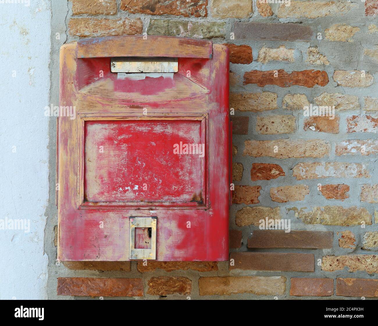 mailbox of red color on the brick wall Stock Photo - Alamy
