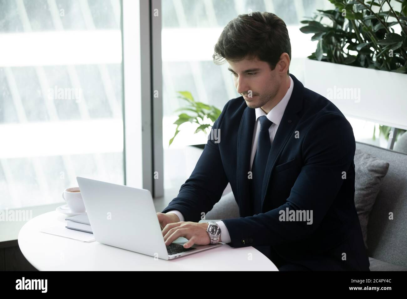 Business man typing hi-res stock photography and images - Alamy