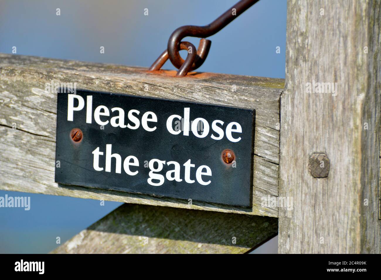 Please Close the Gate Sign Fixed to a Wooden Gate, UK Stock Photo - Alamy
