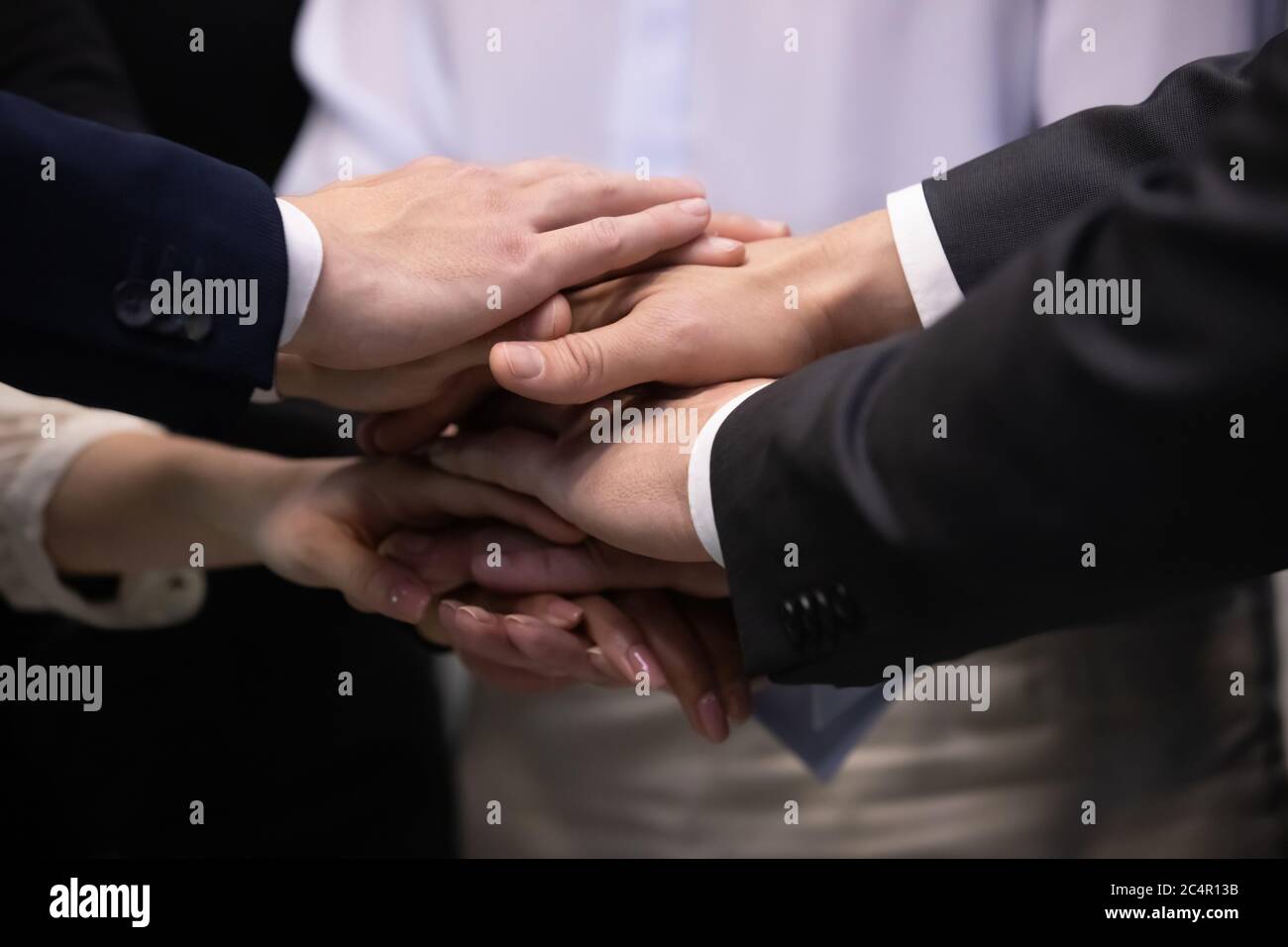 Teamwork concept, close up with joined hands of businesspeople team ...