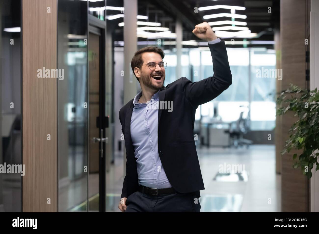 Successful business man celebrating victory, cheering to success Stock ...