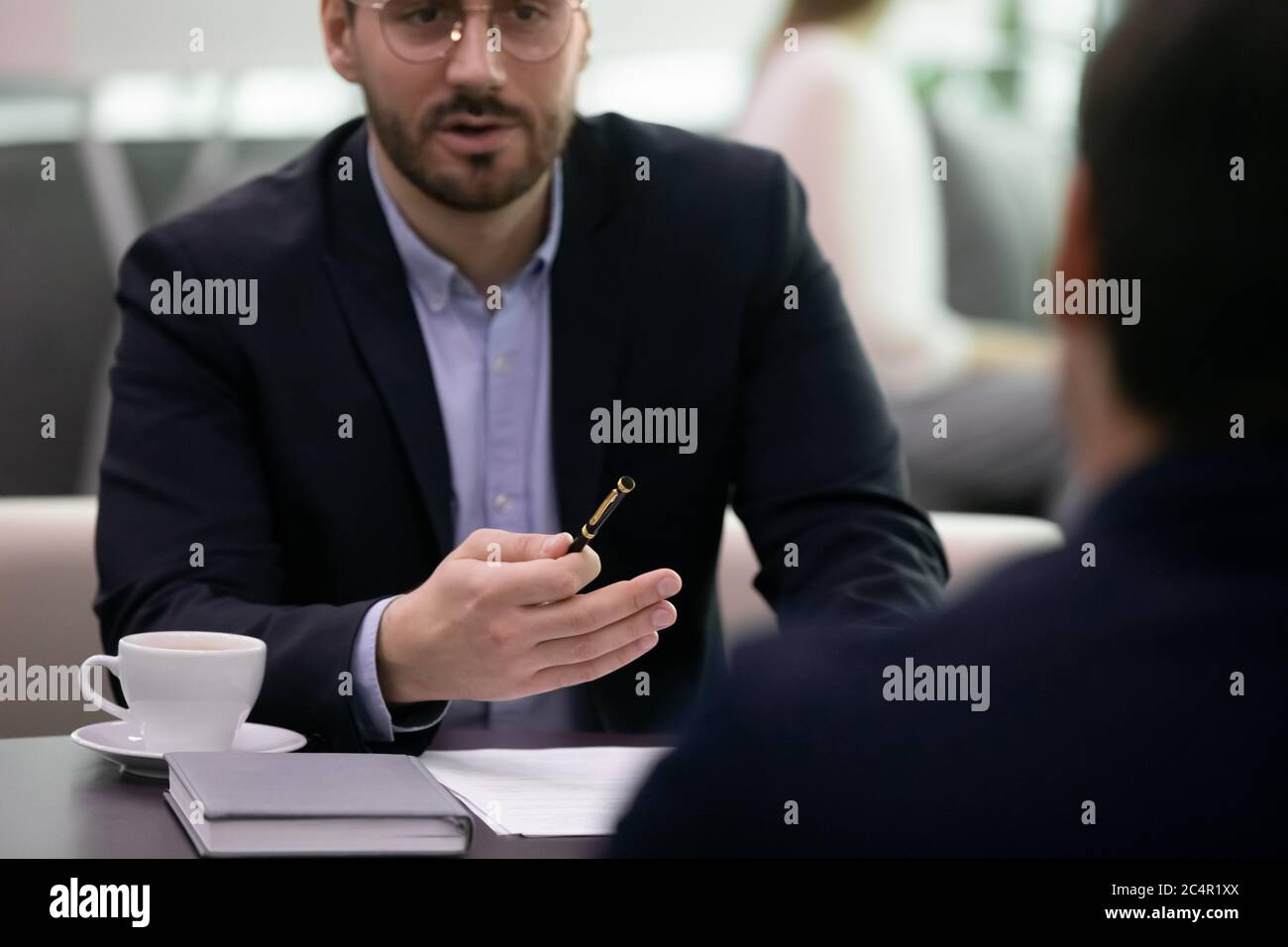 Business man explaining contract or deal details to employee Stock ...