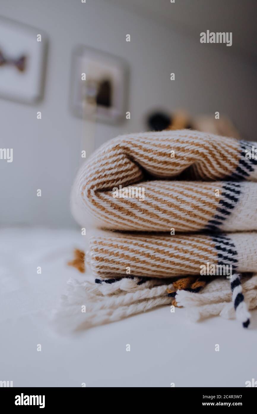 Stacked Knitted Plaid with Fringe Stock Photo - Alamy