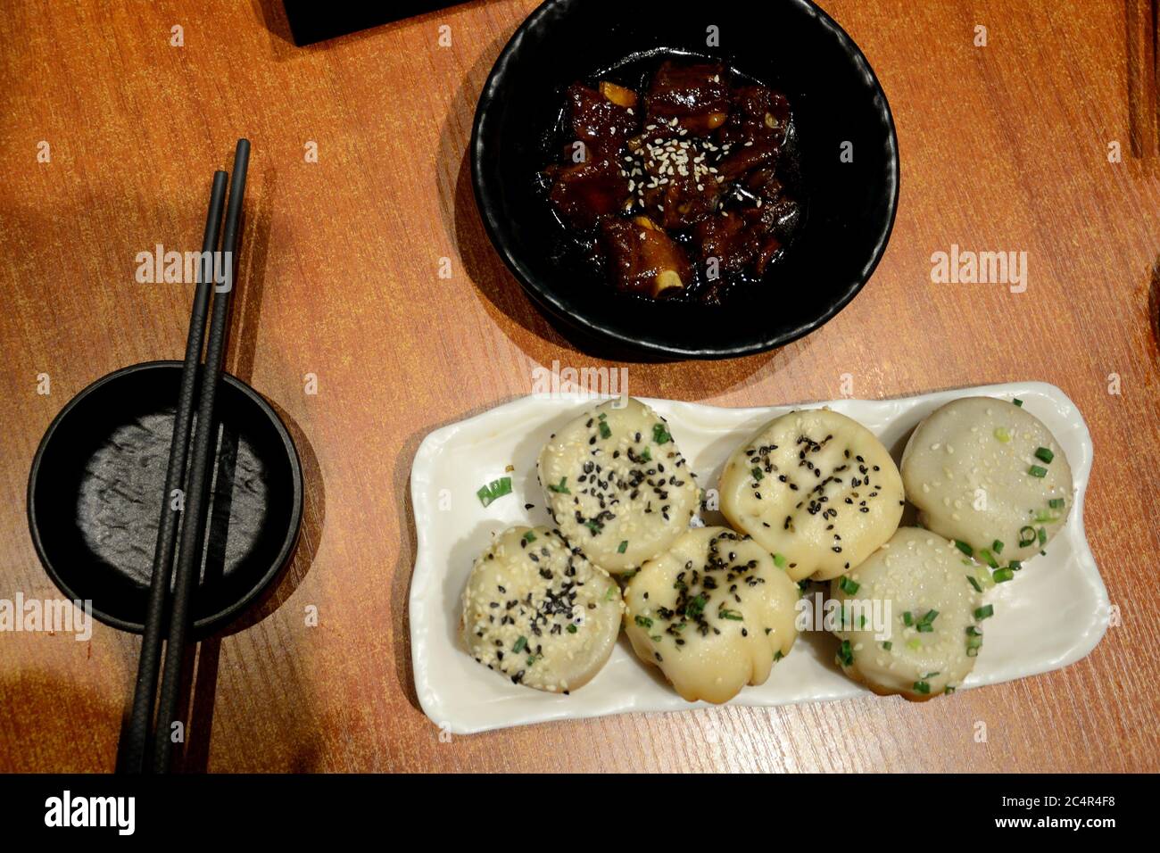 Typical Chinese food on tablechi in Guangzhou, China. Chinese dumplings ...
