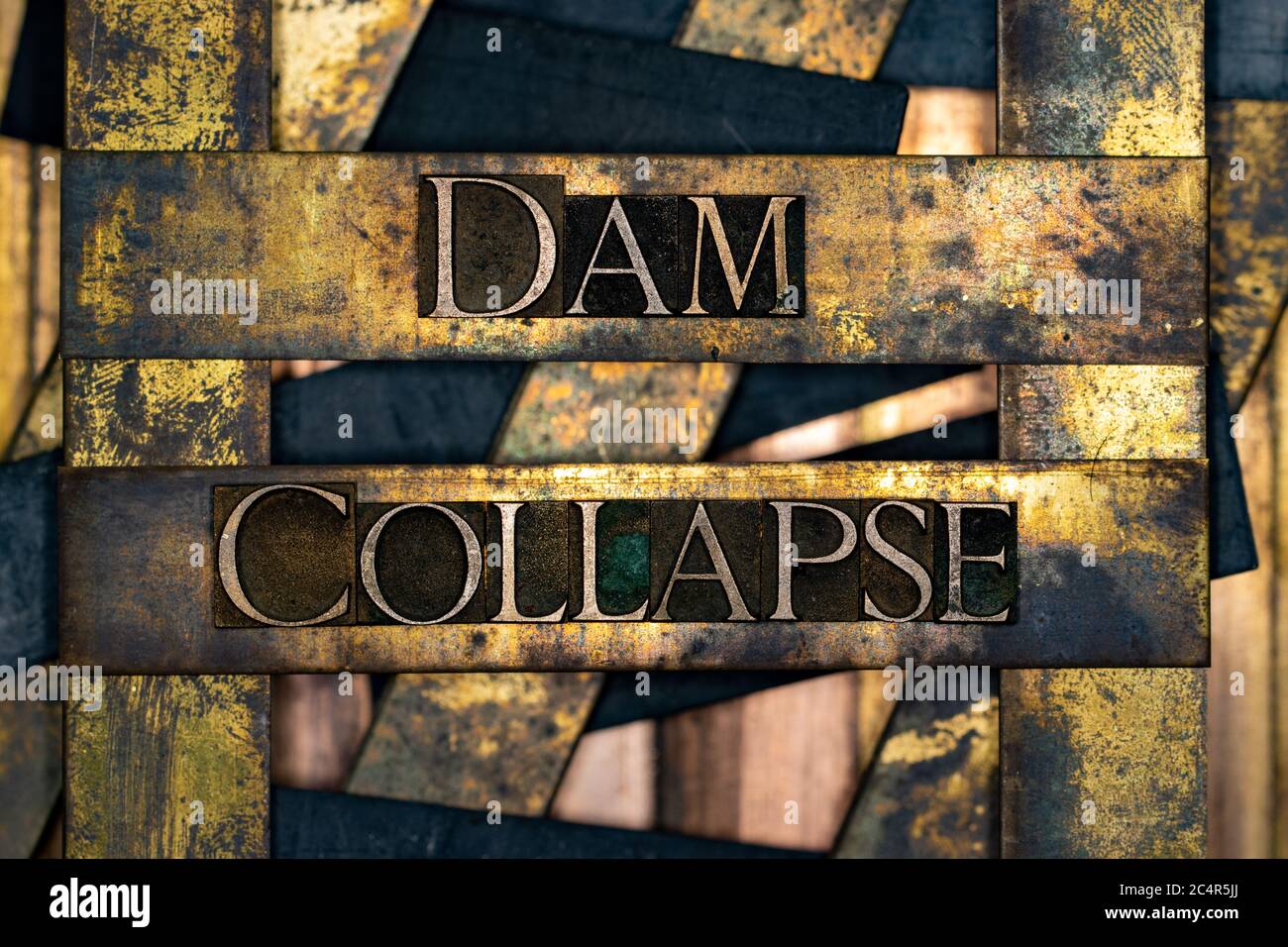 Dam Collapse text formed with real authentic typeset letters on vintage ...