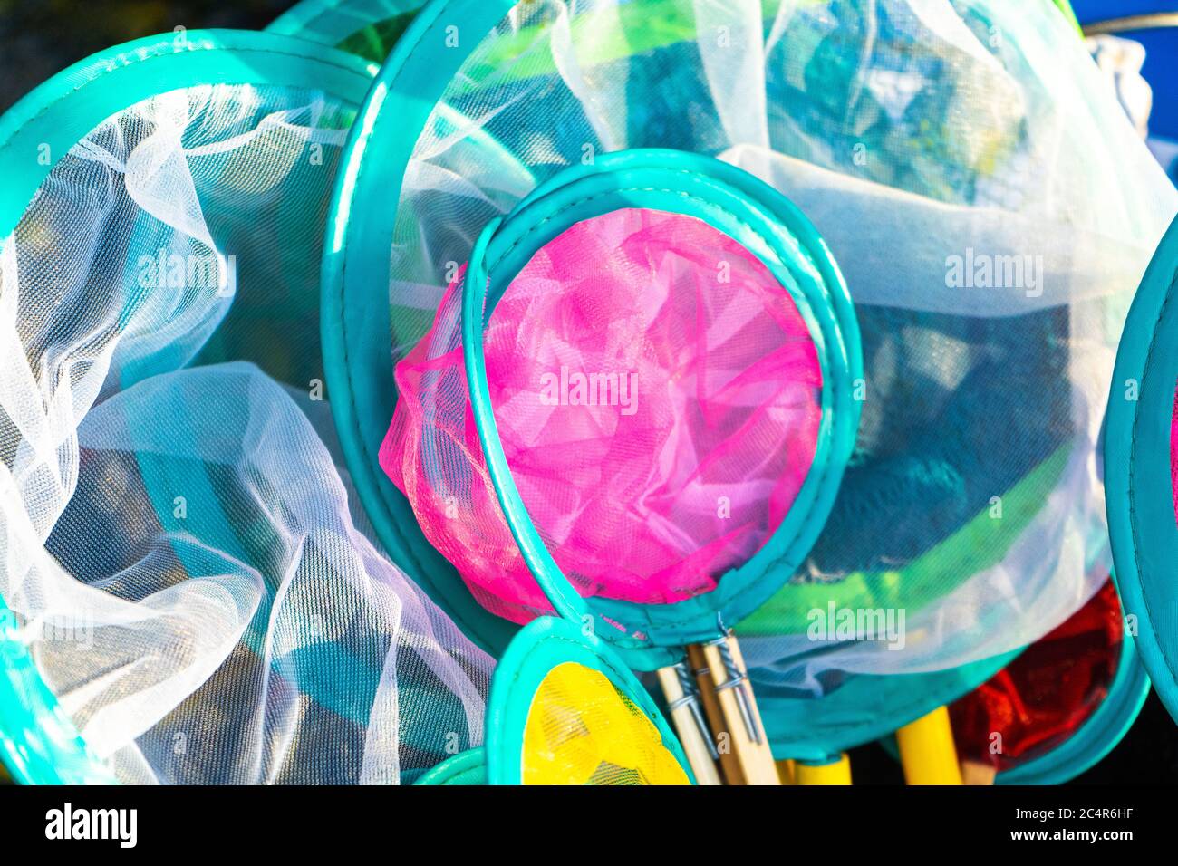 Colored nets for catching fish or butterflies. Fun for kids Stock Photo ...