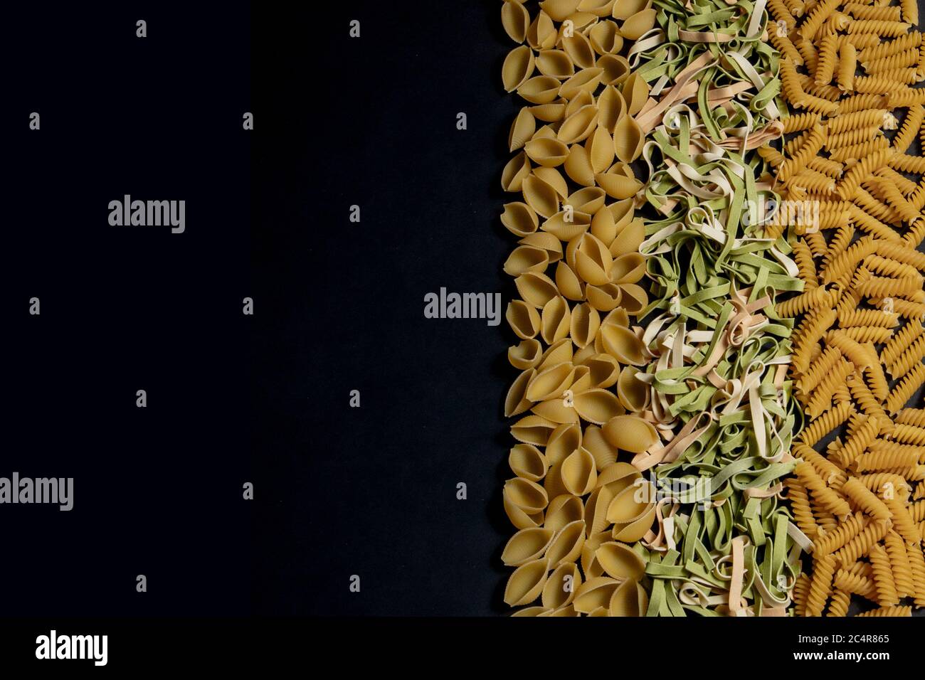 Variety of types and shapes of dry Italian pasta. Italian Macaroni raw ...