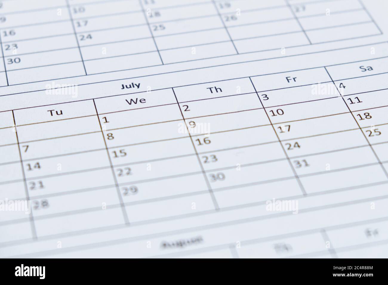 July calendar month on a piece of paper Stock Photo - Alamy