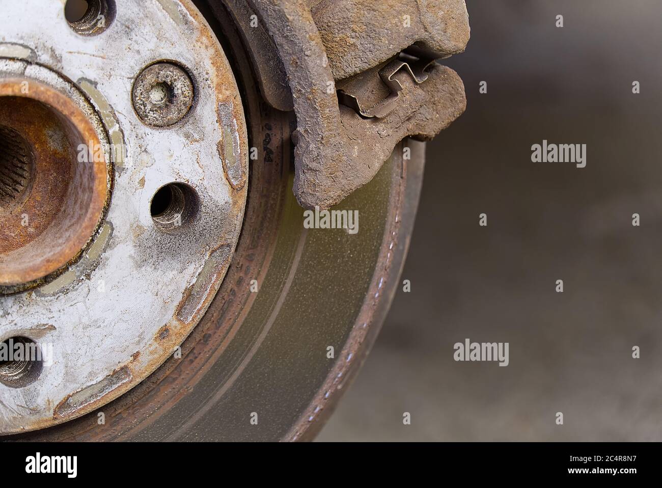 Old and dirty rear dump break of the vehicle for repair. Brakes on a ...