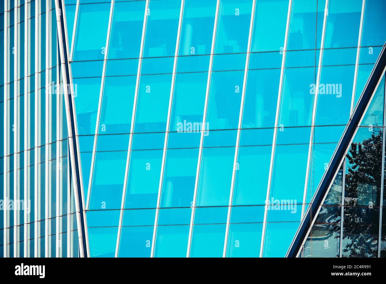 Facade of a modern building with glass windows Stock Photo - Alamy