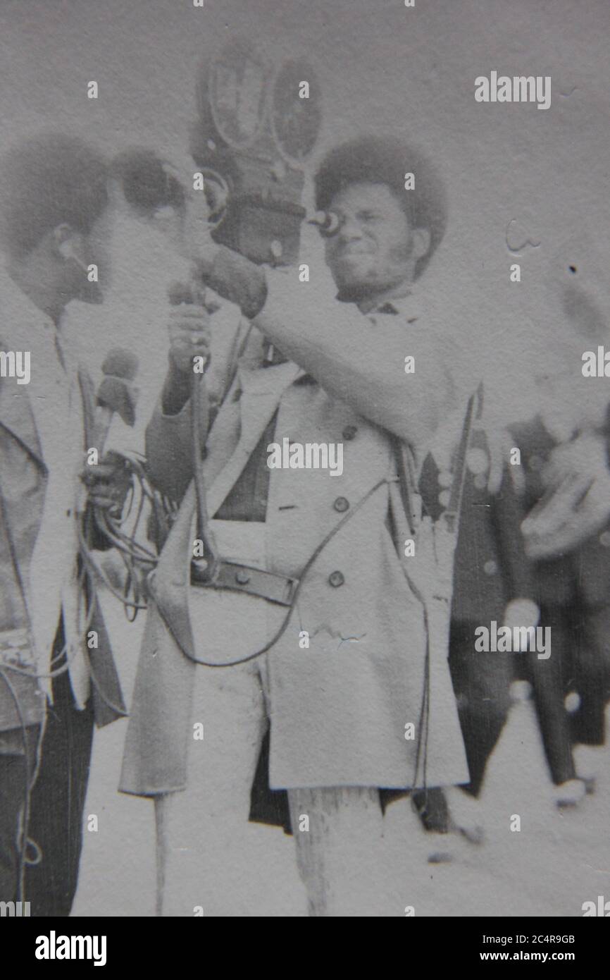 Fine 70s vintage black and white photography of a cameraman taking ...