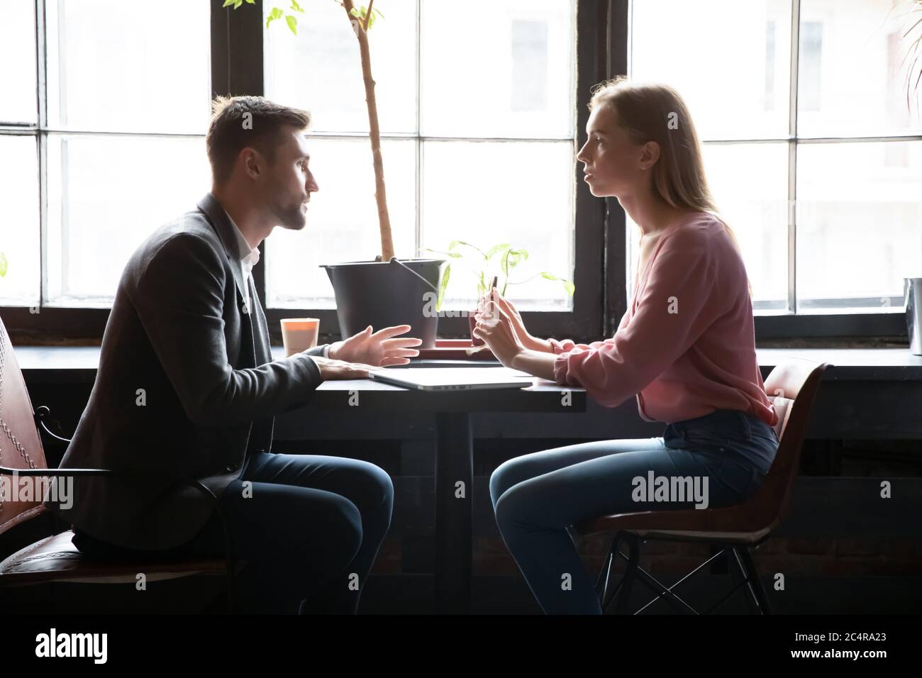 HR manager and applicant talking during job interview formal meeting ...