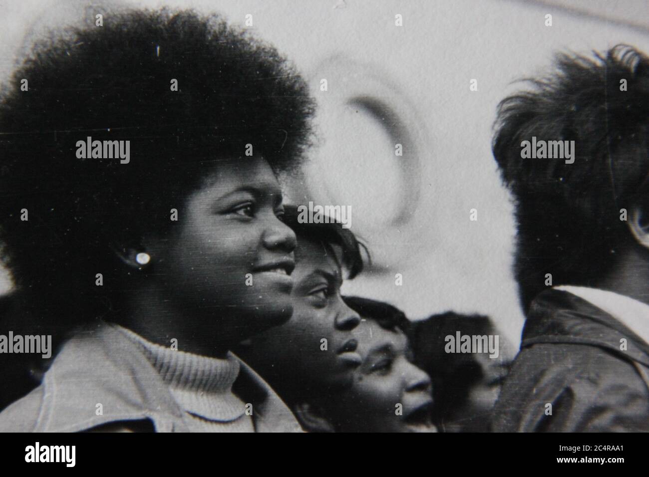 Fine 70s vintage black and white photography of a boisterous crowd in ...