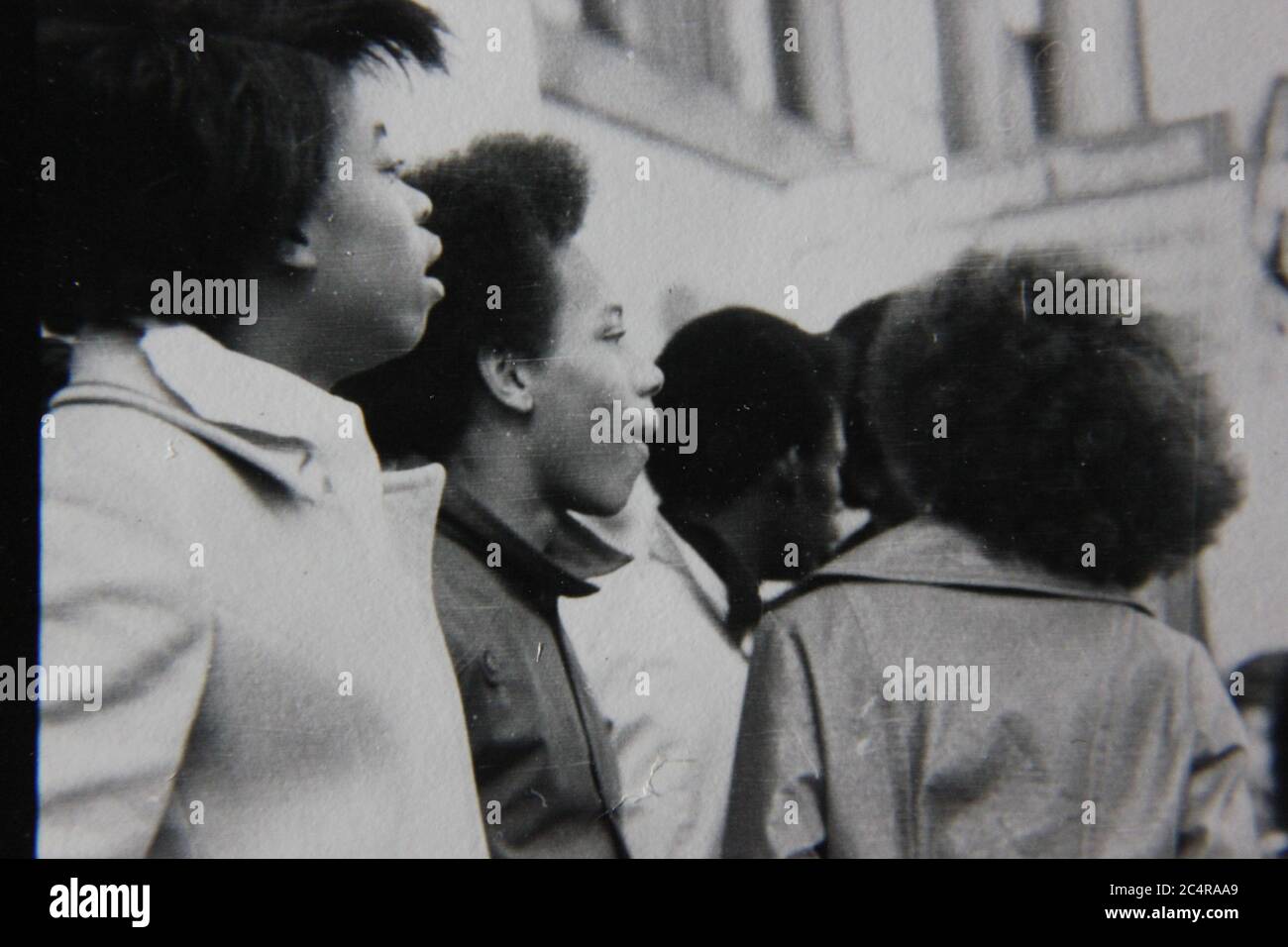 Fine 70s vintage black and white photography of a boisterous crowd in ...