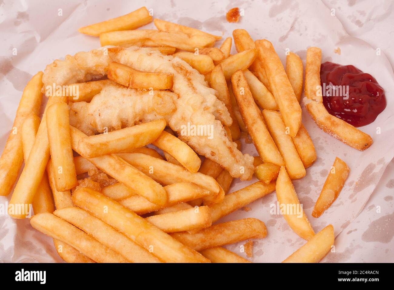 Fish and Chips wrapped in paper Stock Photo - Alamy