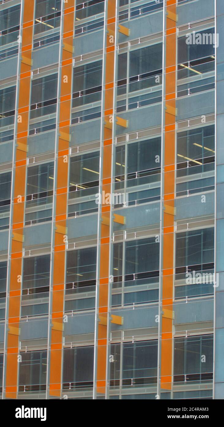 Modern building with glass windows reflected sky. Background in ...