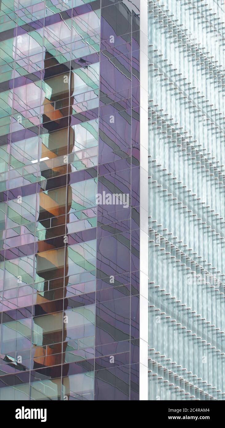 Modern building with glass windows reflected sky. Background in ...