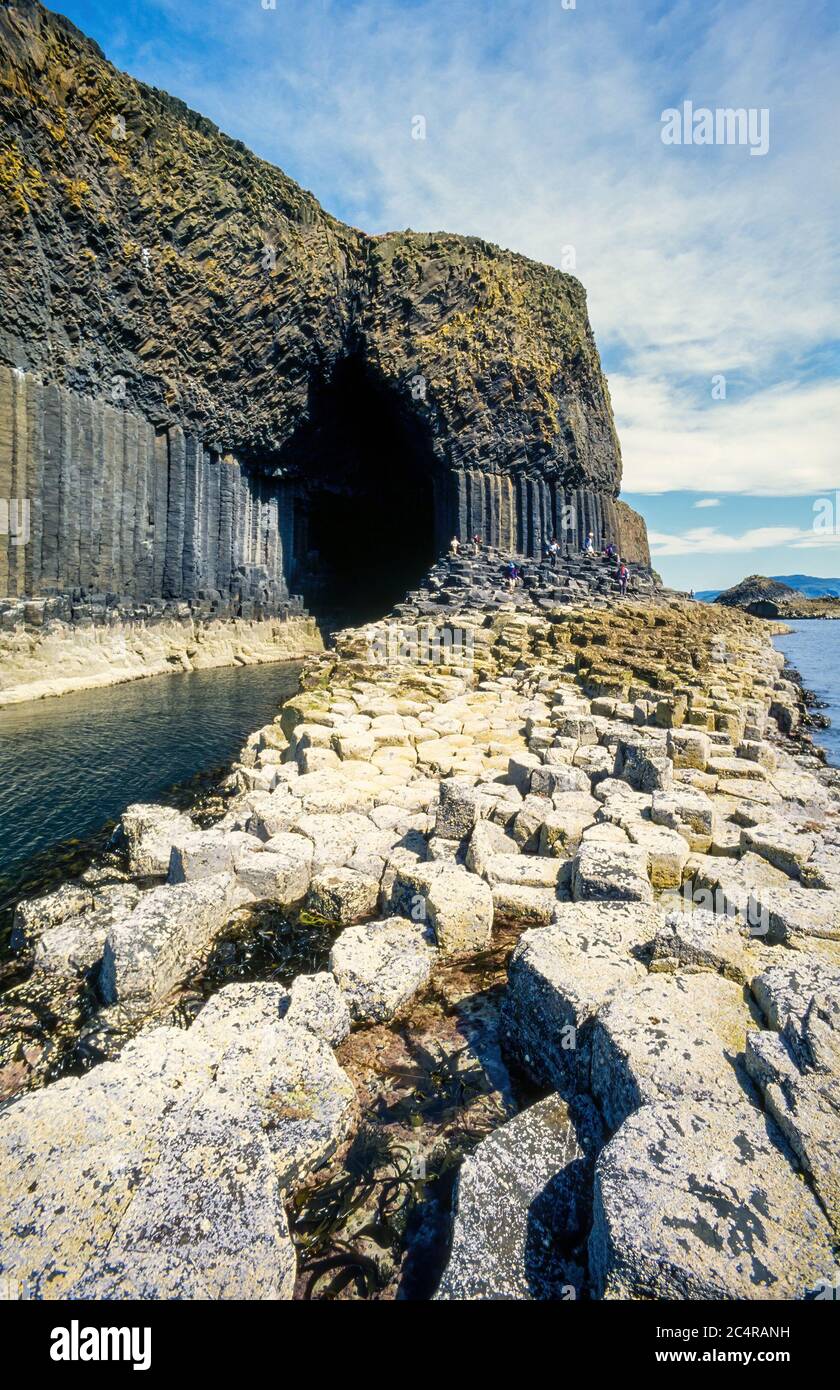 Columnar basalt columns and cliffs either side of Fingal's Cave, The ...