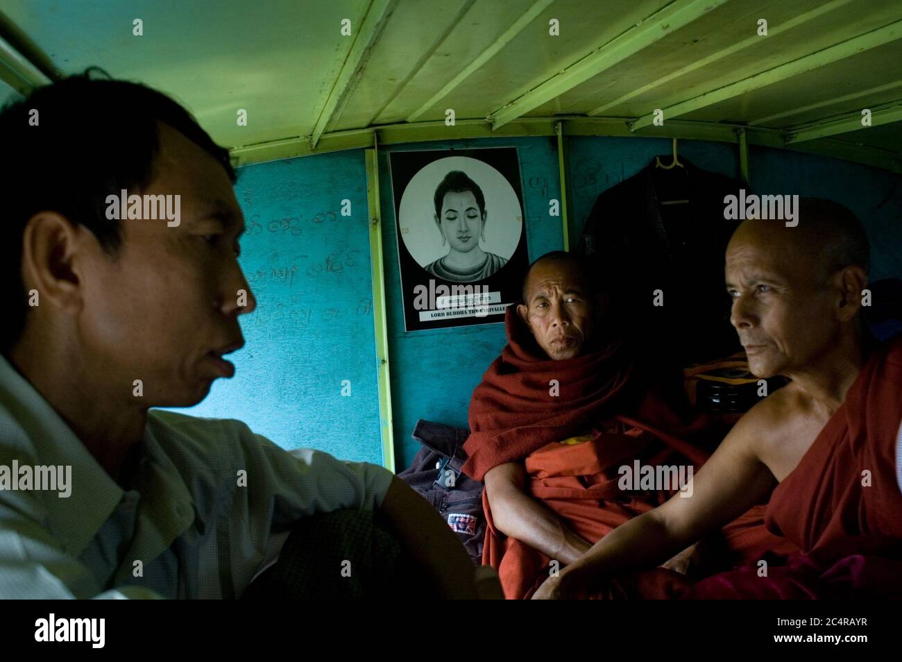 Monks travelling in the upper-class compartment of the express boat to ...