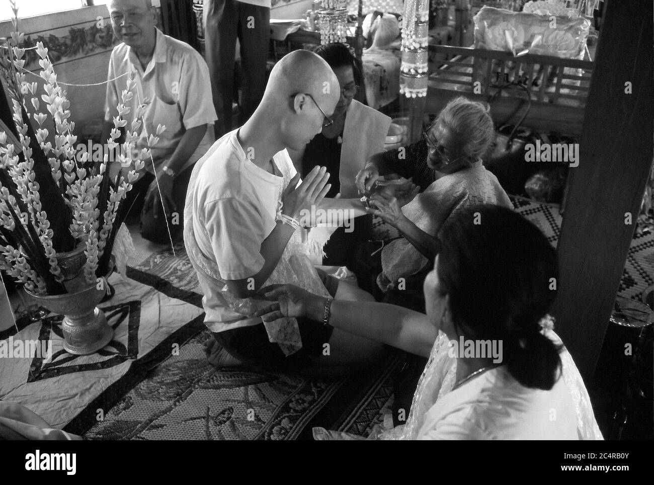 Rituals before the ordination of a lay man for short-term monkhood at ...