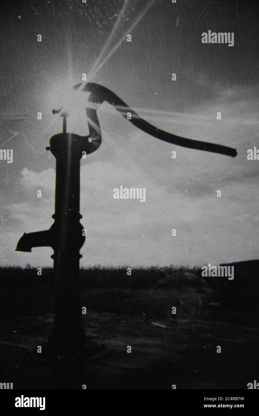 Fine 70s vintage black and white photography of a simple hand water ...