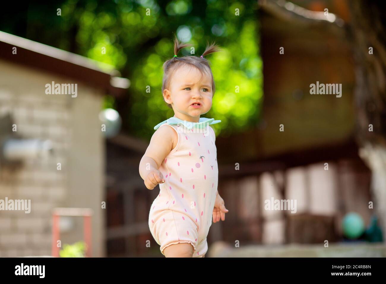 Toddler Girl Learns to Walk Stock Photo - Alamy