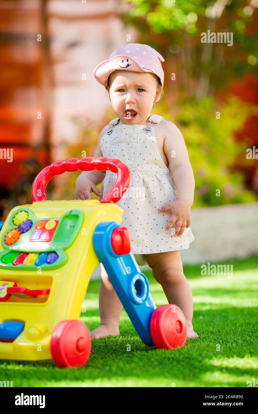 Toddler Girl Learns to Walk Stock Photo - Alamy