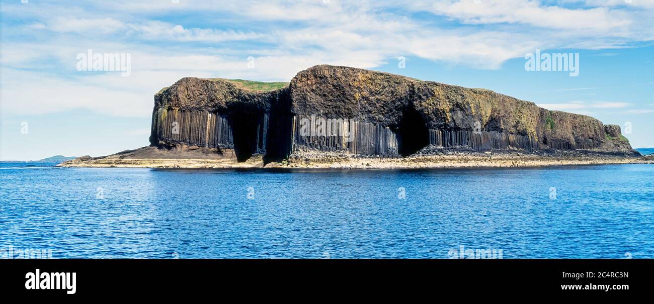 Fingal's Cave (on the right) and cliffs made of columnar basalt columns ...