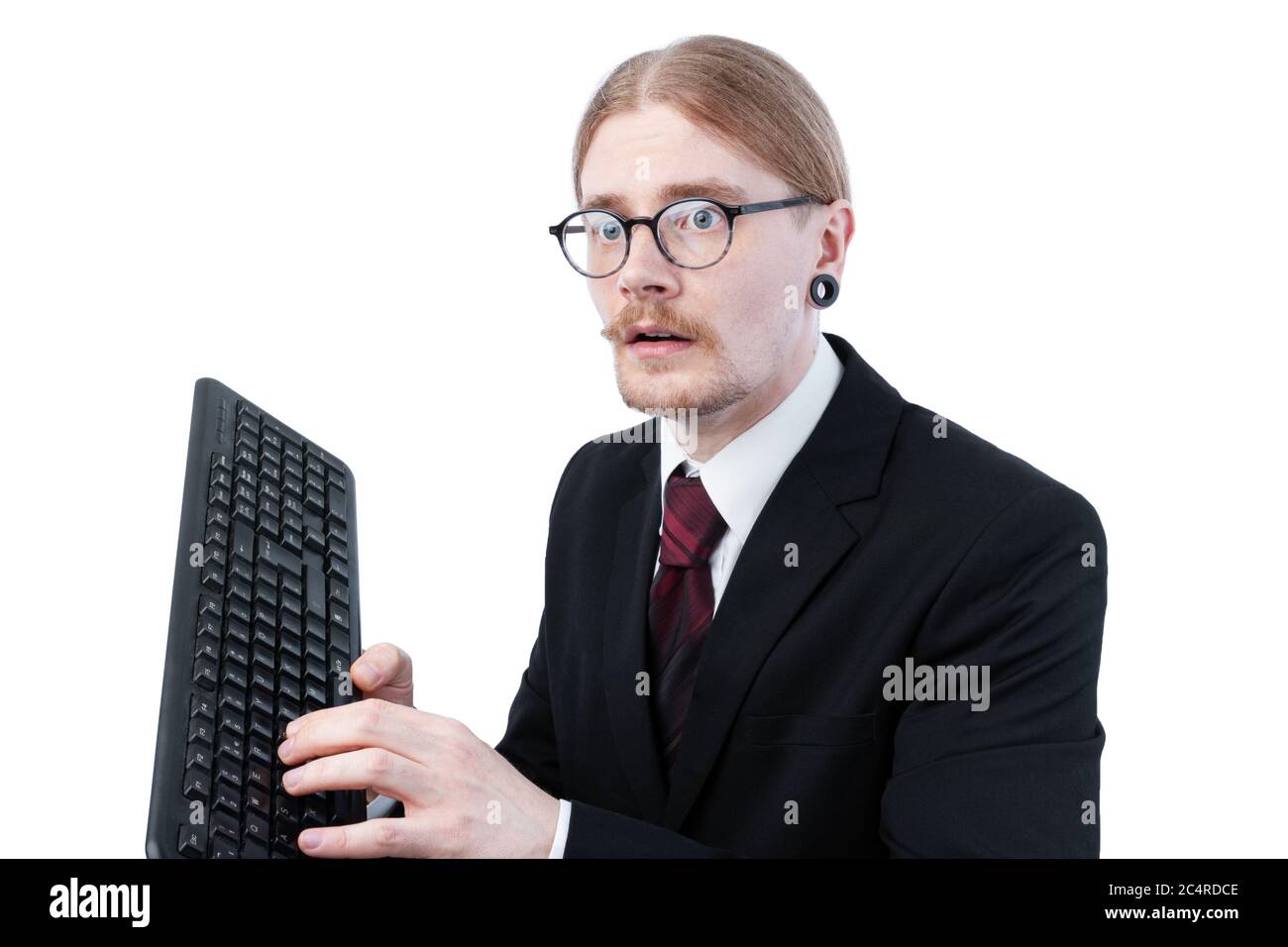 Scared Office Worker With Long Tied Back Hair and Glasses Using ...