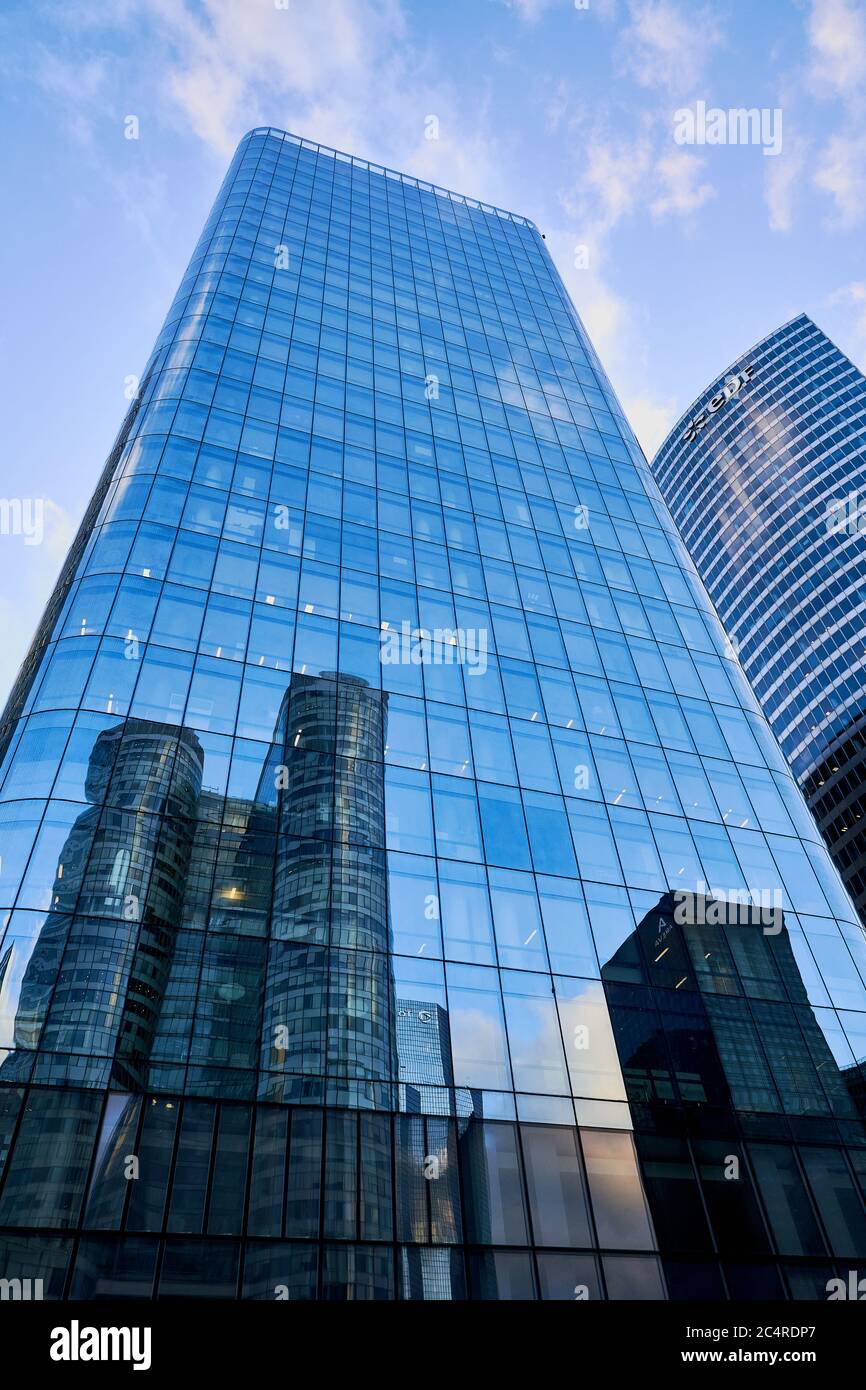 The coeur defense building reflected in the opposite skyscraper and ...