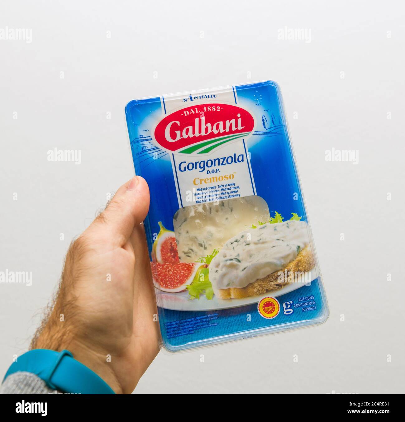 Munich, Germany - Oct 21, 2019: Male hand holding against white ...