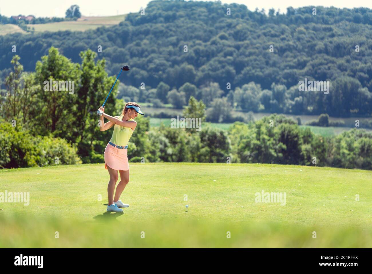 Exercise playing golf hi-res stock photography and images - Alamy