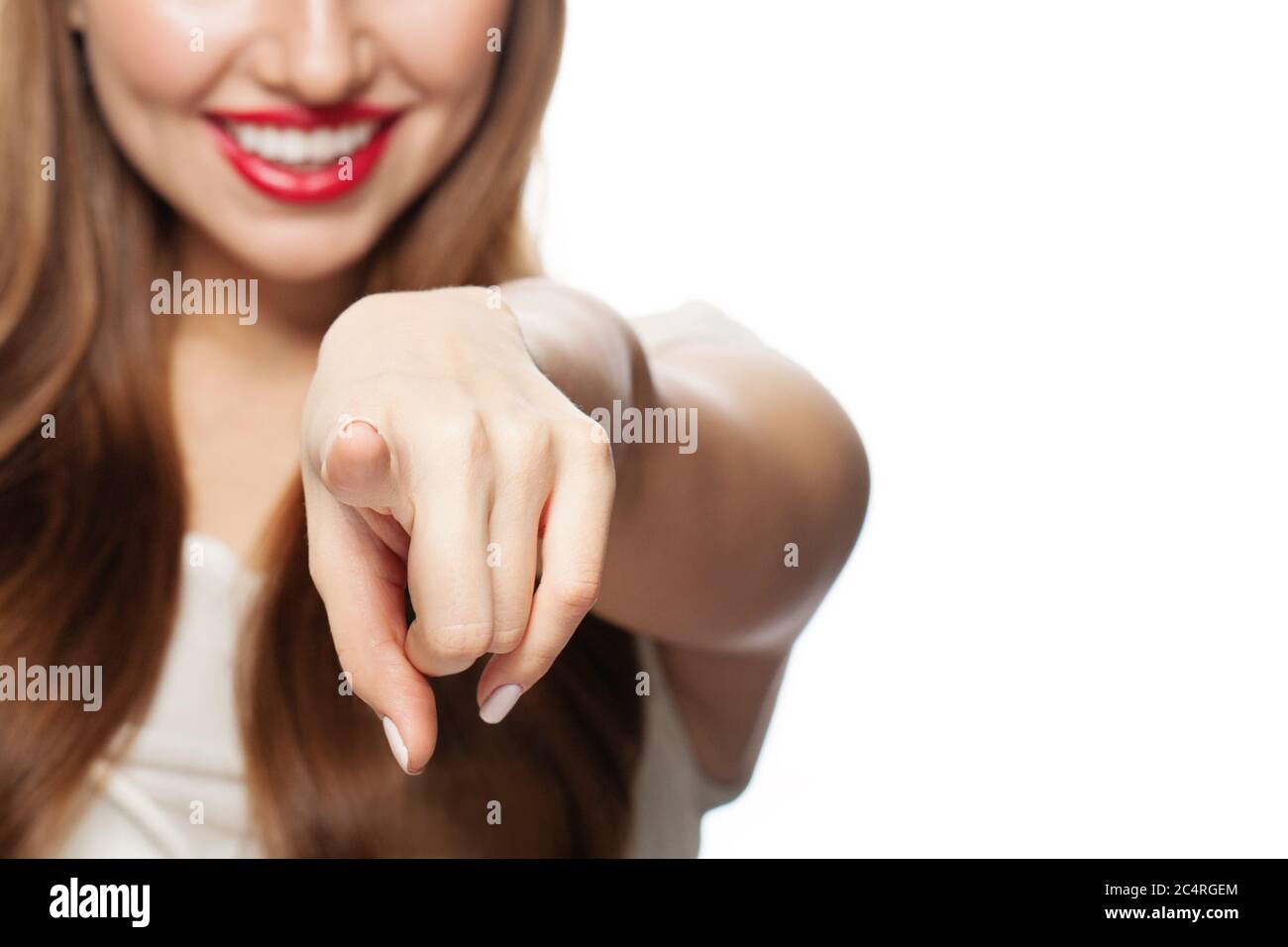 Woman points finger smiling hi-res stock photography and images - Alamy