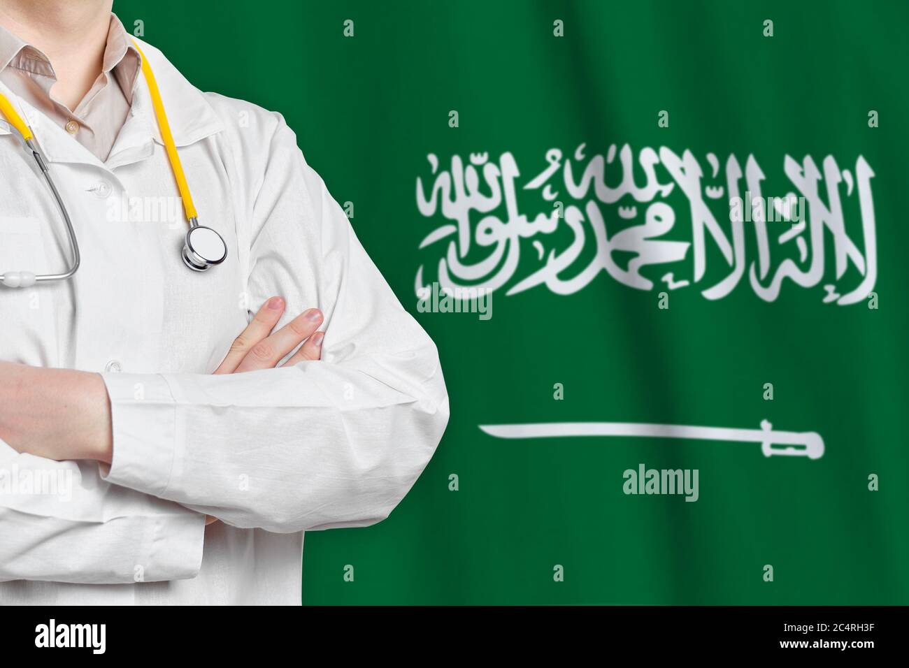 Kingdom of Saudi Arabia healthcare concept with doctor on flag ...