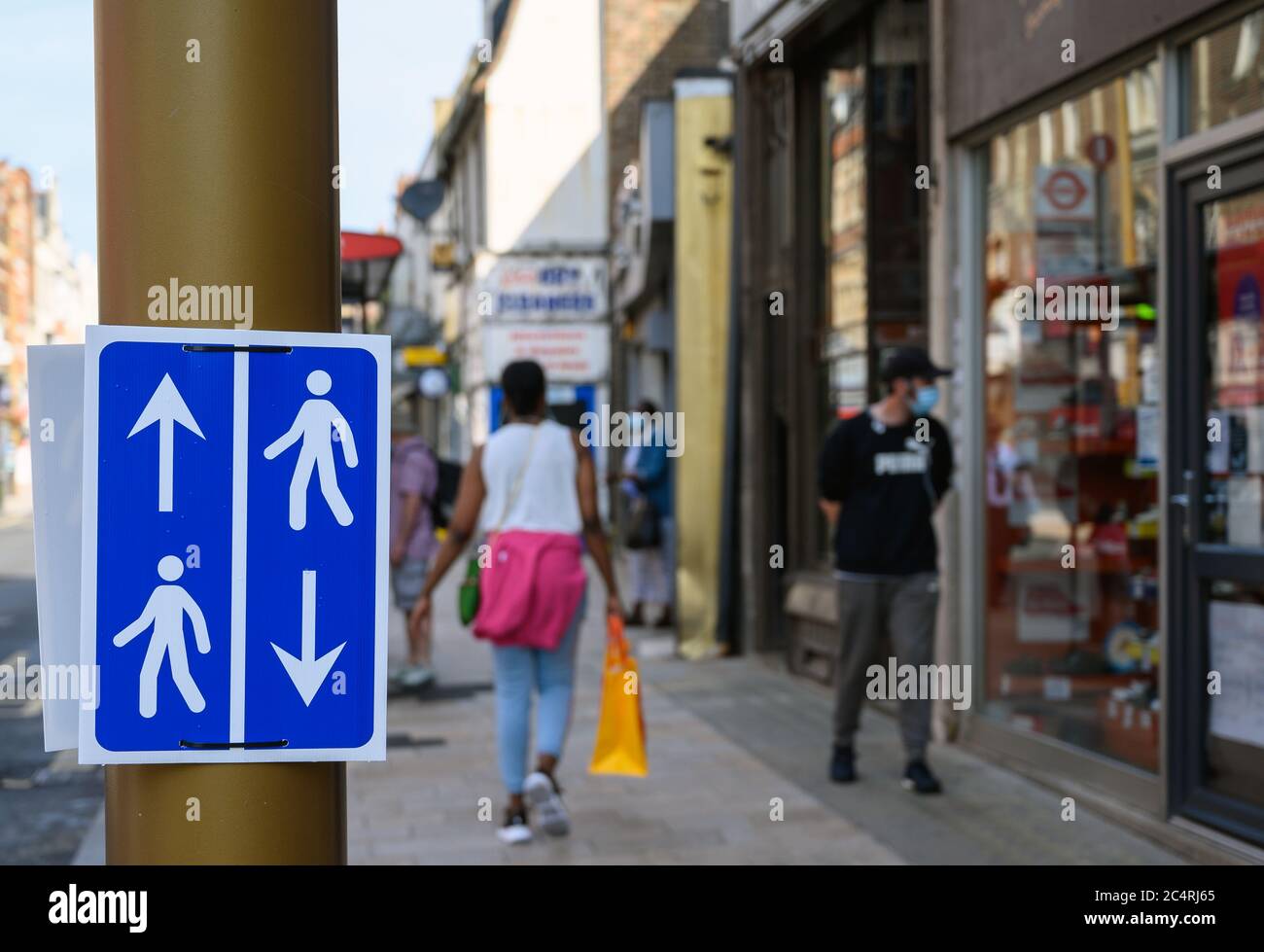 Walk on the left sign in Bromley High Street during the coronavirus ...