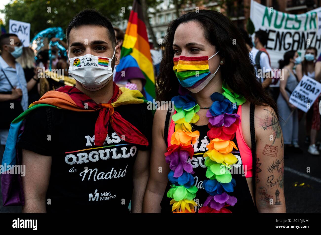 Madrid, Spain. 28th June, 2020. Demonstrators wearing face masks with ...