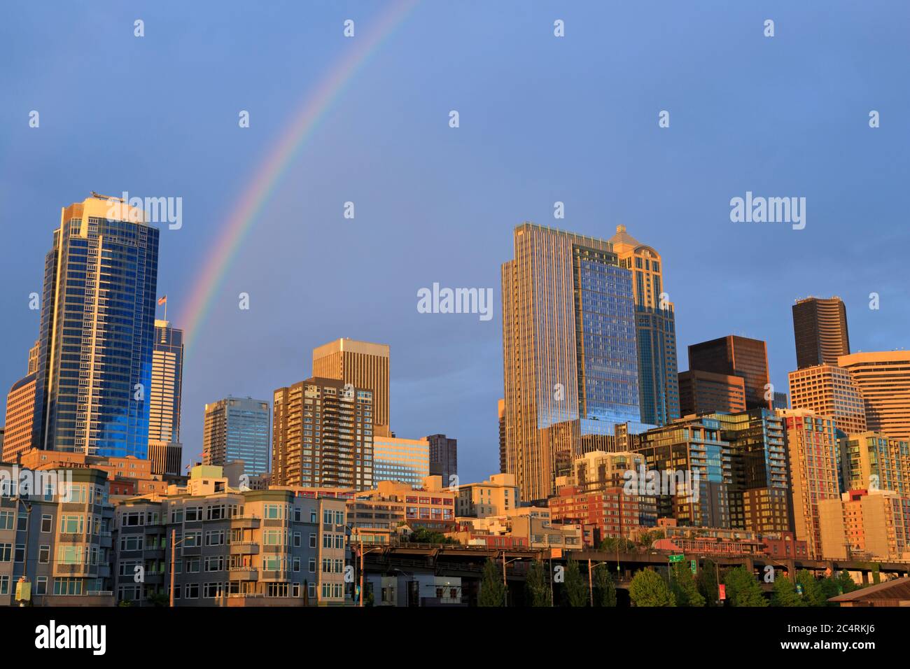 Rainbow over downtown hi-res stock photography and images - Alamy