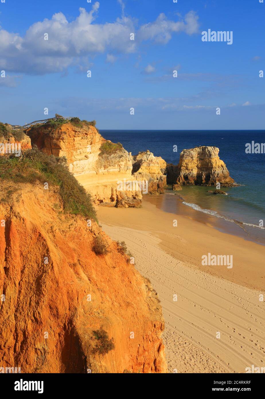 Portugal, Portimao, Praia do Vau. Cliff top view over the rock ...