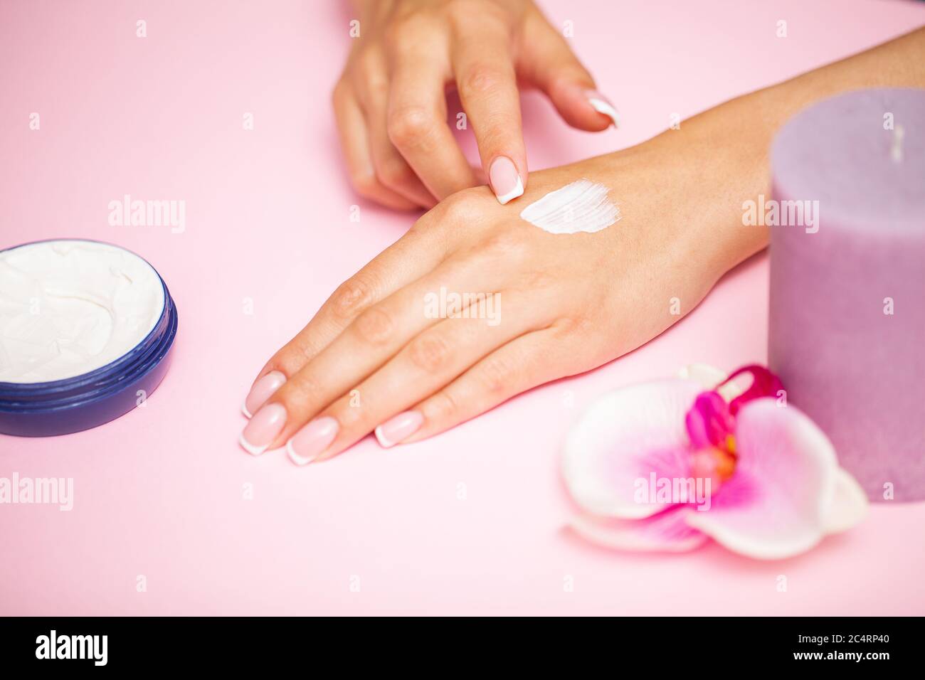 Hand skin care, woman applies moisturizer on soft silky skin Stock ...