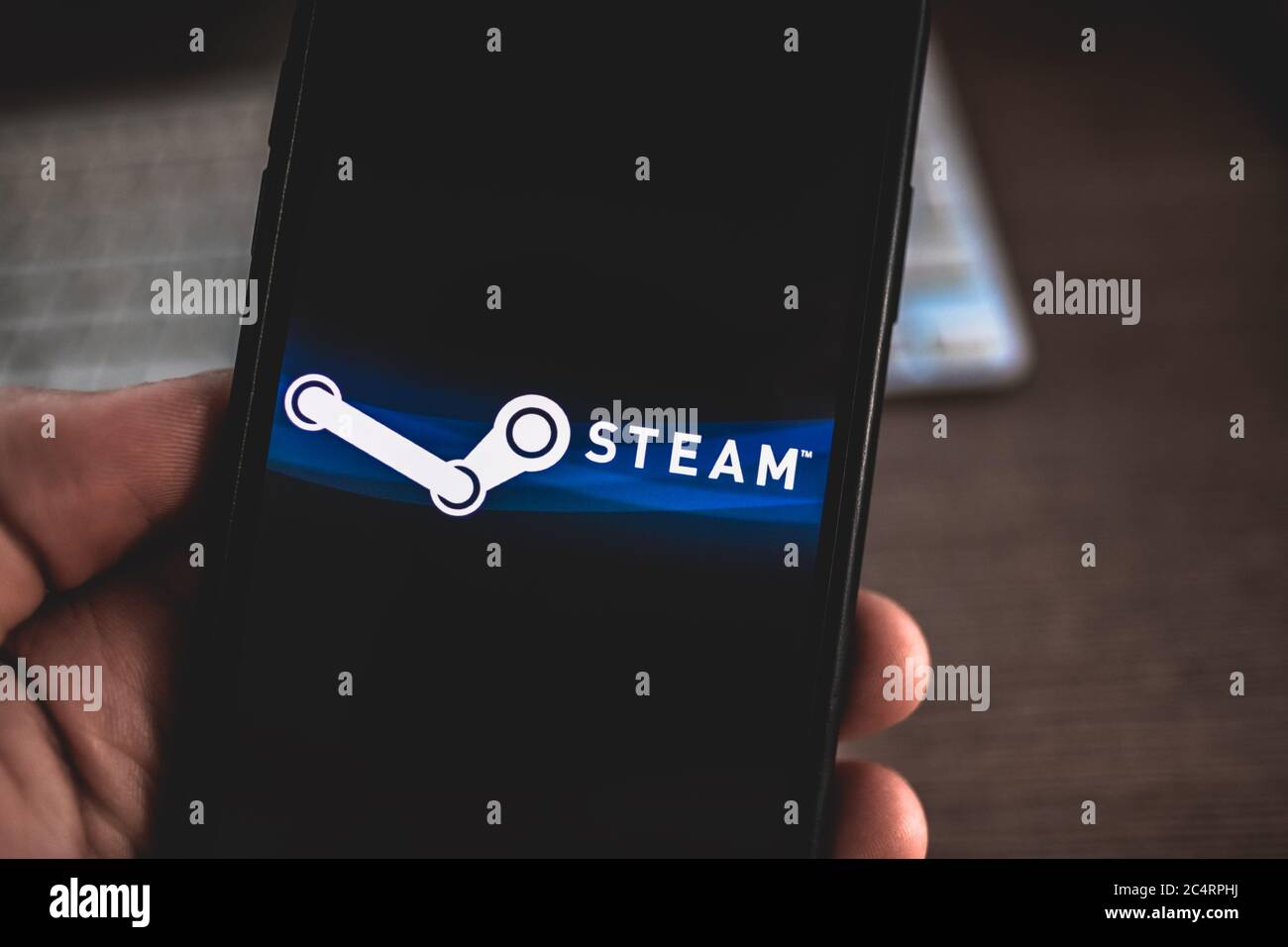 Steam app logo on the smartphone screen Stock Photo - Alamy