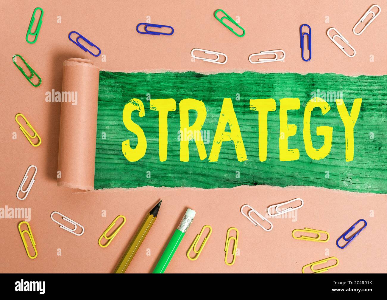 Writing note showing Strategy. Business concept for action plan or ...
