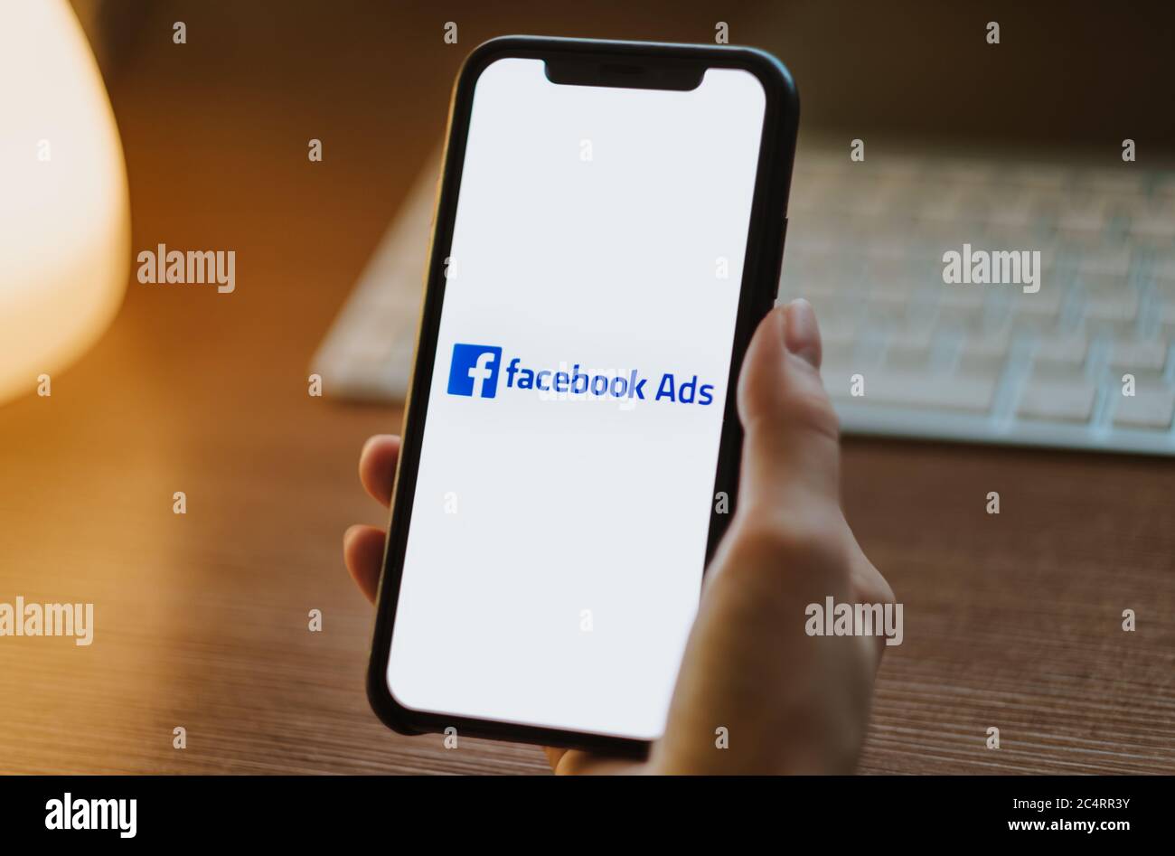 Facebook ads logo on the screen Stock Photo - Alamy
