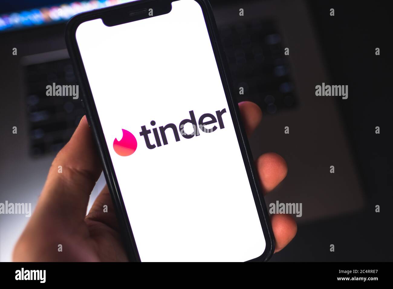 Tinder logo on smartphone screen Stock Photo - Alamy